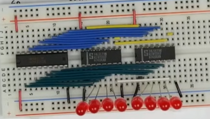 8 blue jumpers which he connects to the bus A yellow enable line (left ...